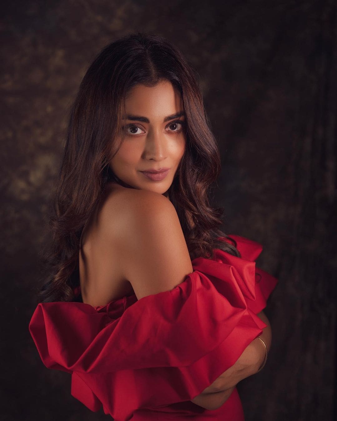 Beautiful Shriya Saran Dazzles in red dress - TrackTollywood